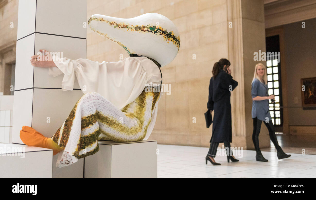 London, UK. 21 March 2018. A performer in a squash-like costume at the ...