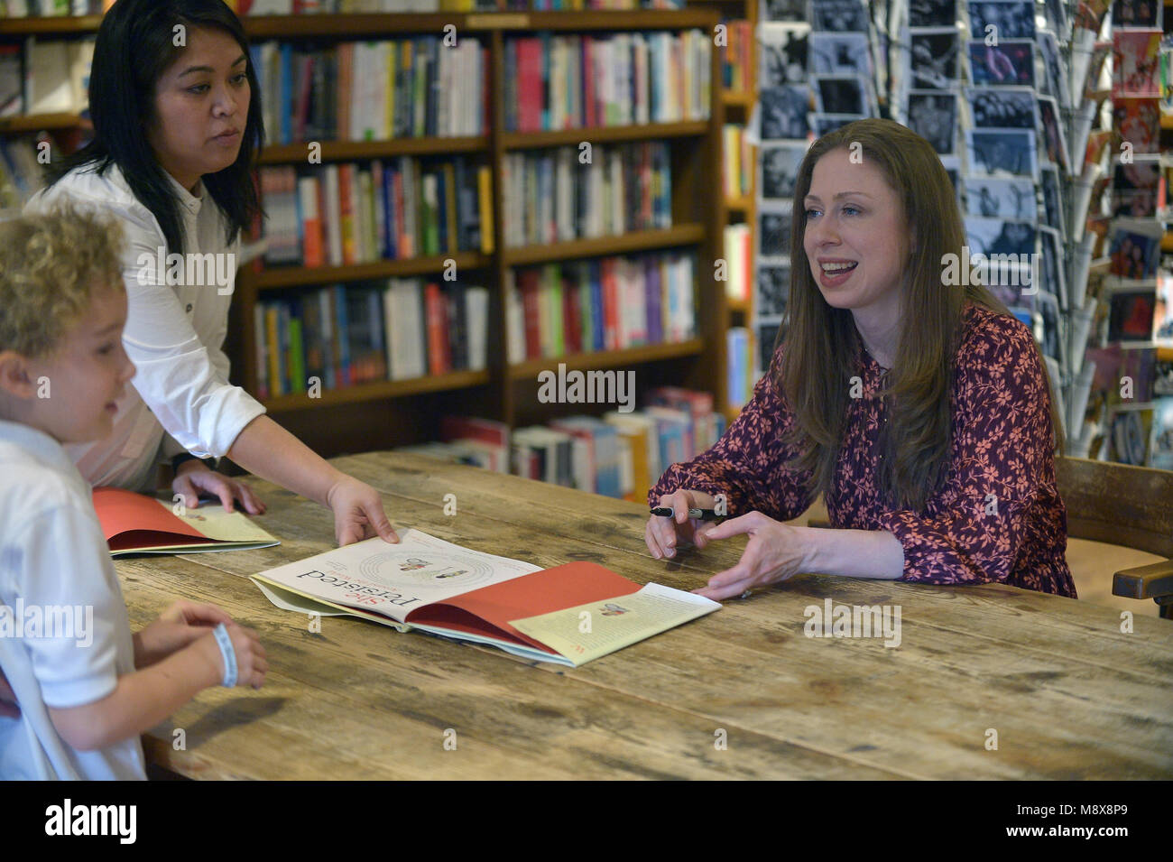 Coral Gables, FL, USA. 19th Mar, 2018. Chelsea Clinton signs copies of ...
