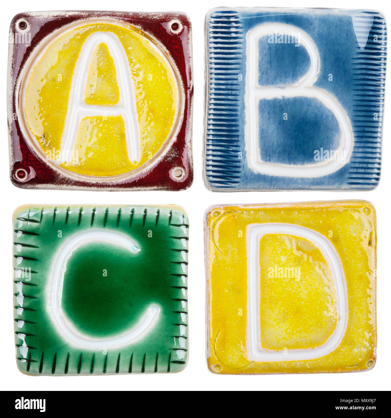 Colorful handmade ceramic letters isolated on white background Stock ...