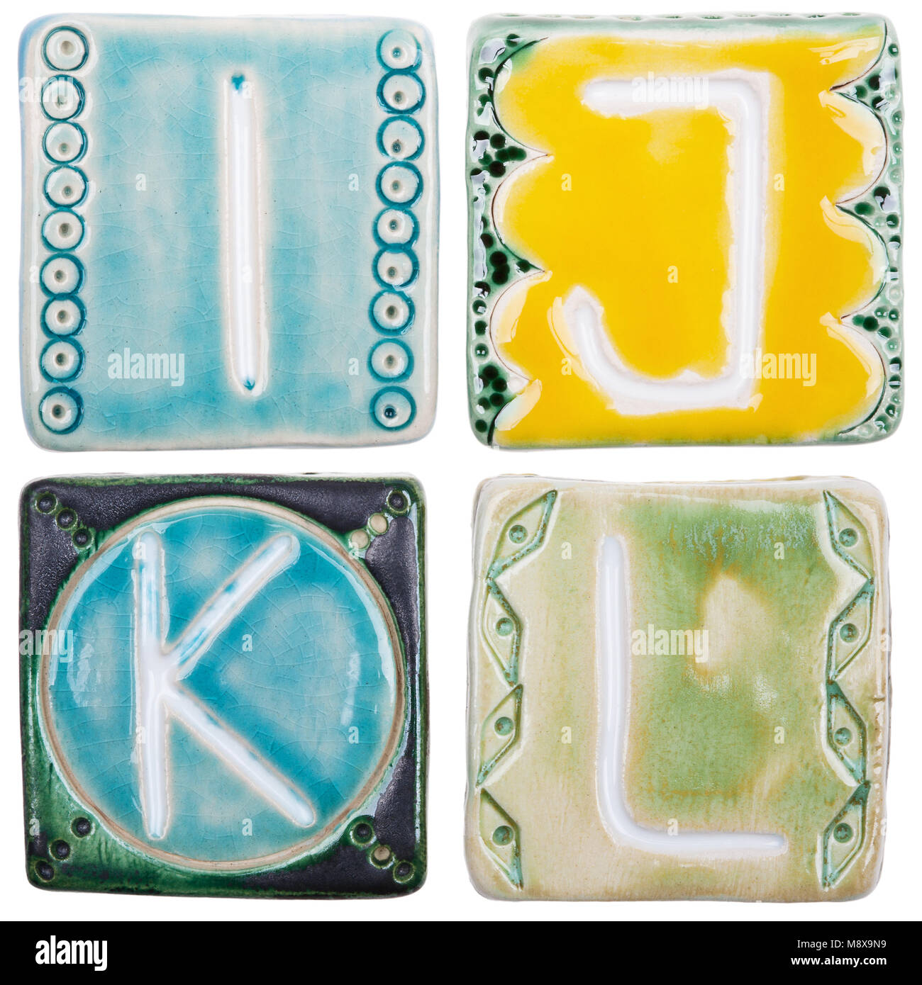 Colorful handmade ceramic letters isolated on white background Stock ...