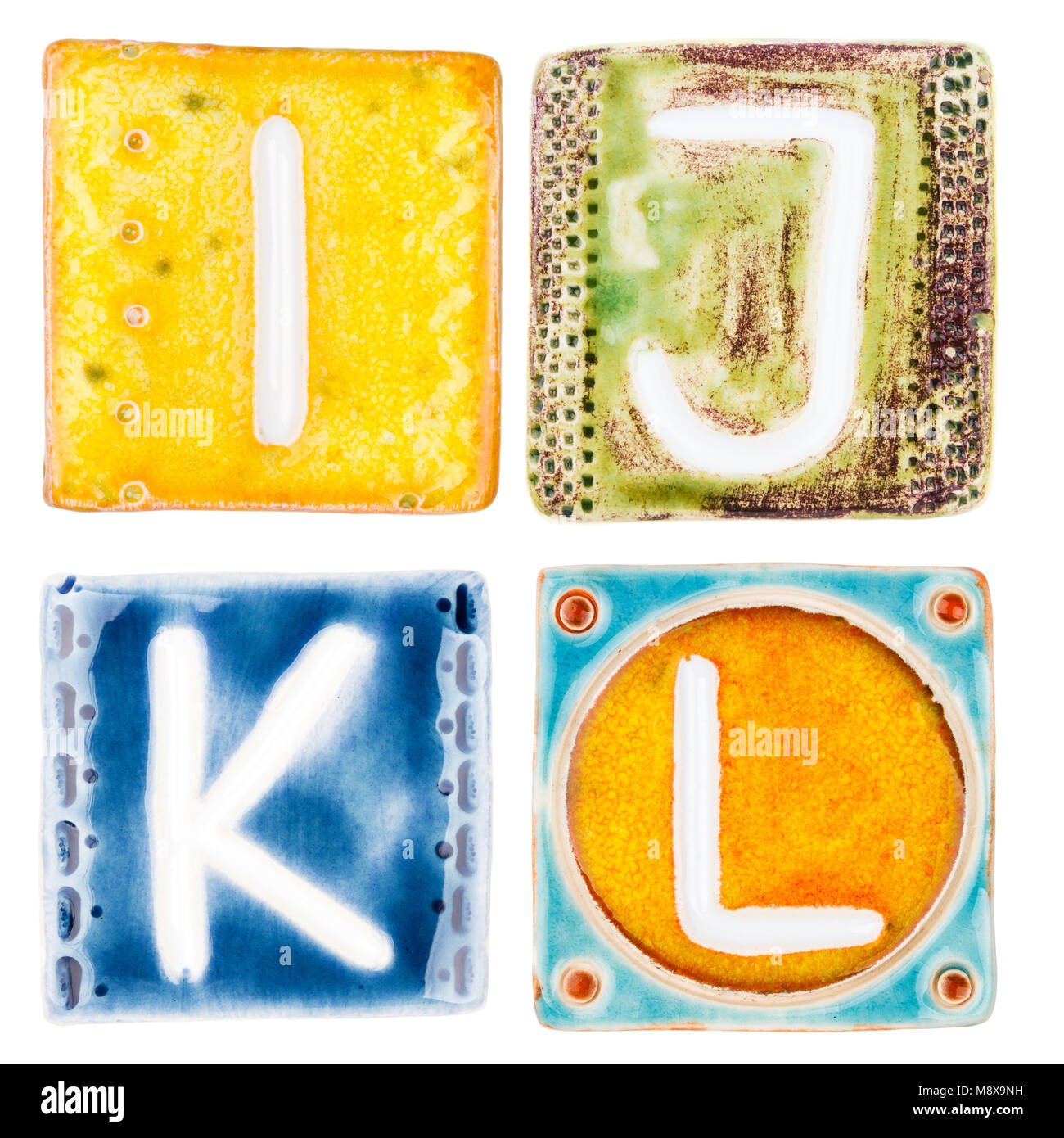 Colorful handmade ceramic letters isolated on white background Stock ...