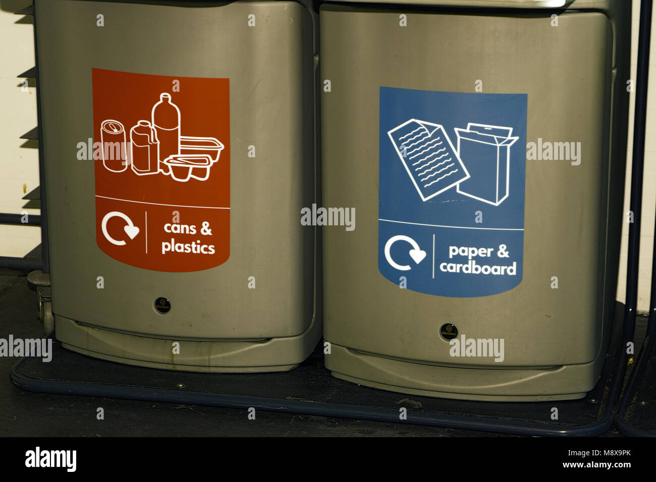 Recycle bins for cans and plastics, and paper and cardboard Stock Photo ...