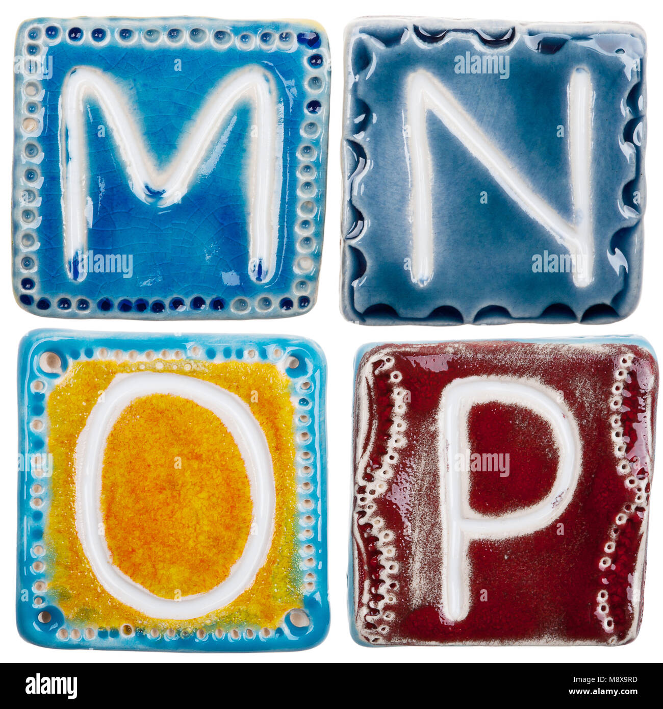 Colorful handmade ceramic letters isolated on white background Stock ...