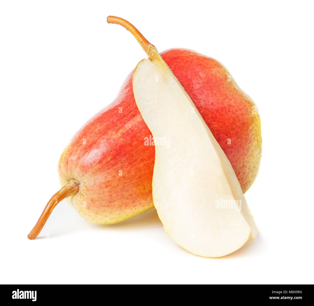 Red pear cut piece isolated on white background Stock Photo - Alamy