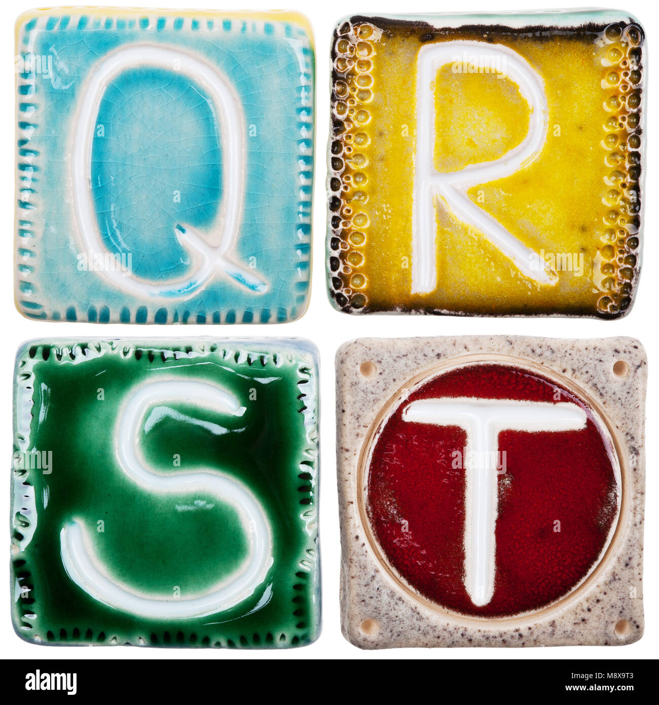 Colorful handmade ceramic letters isolated on white background Stock ...
