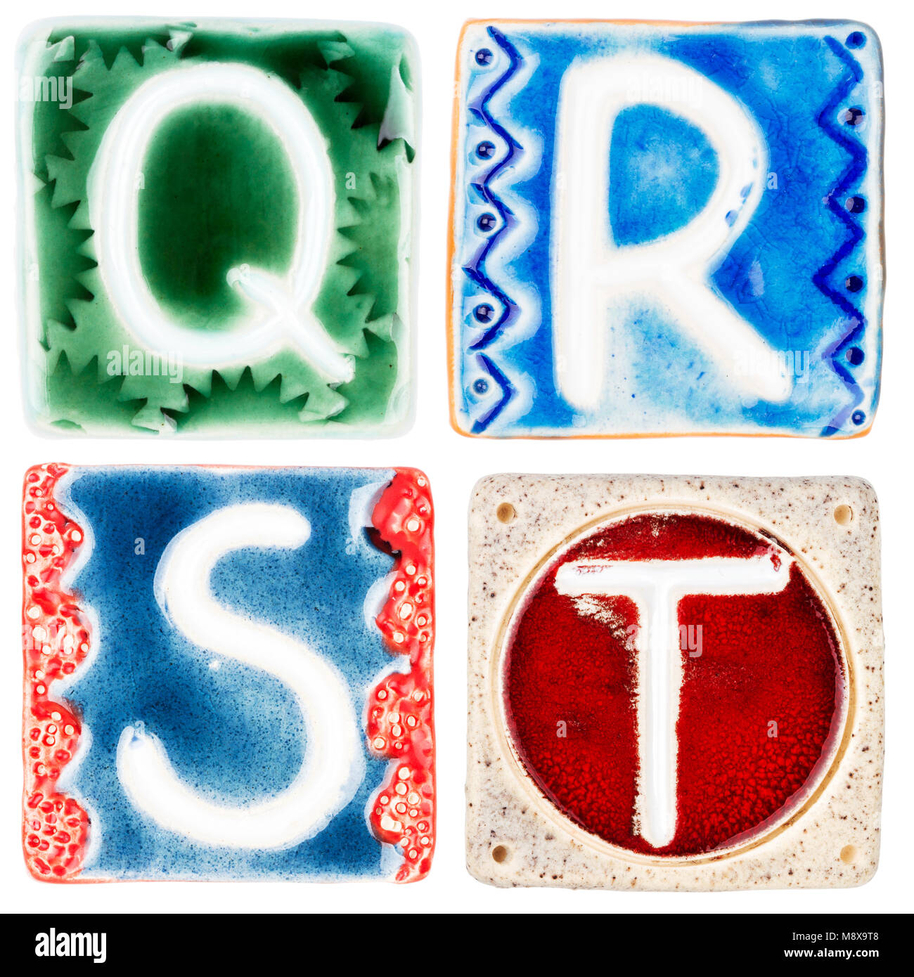 Colorful handmade ceramic letters isolated on white background Stock ...