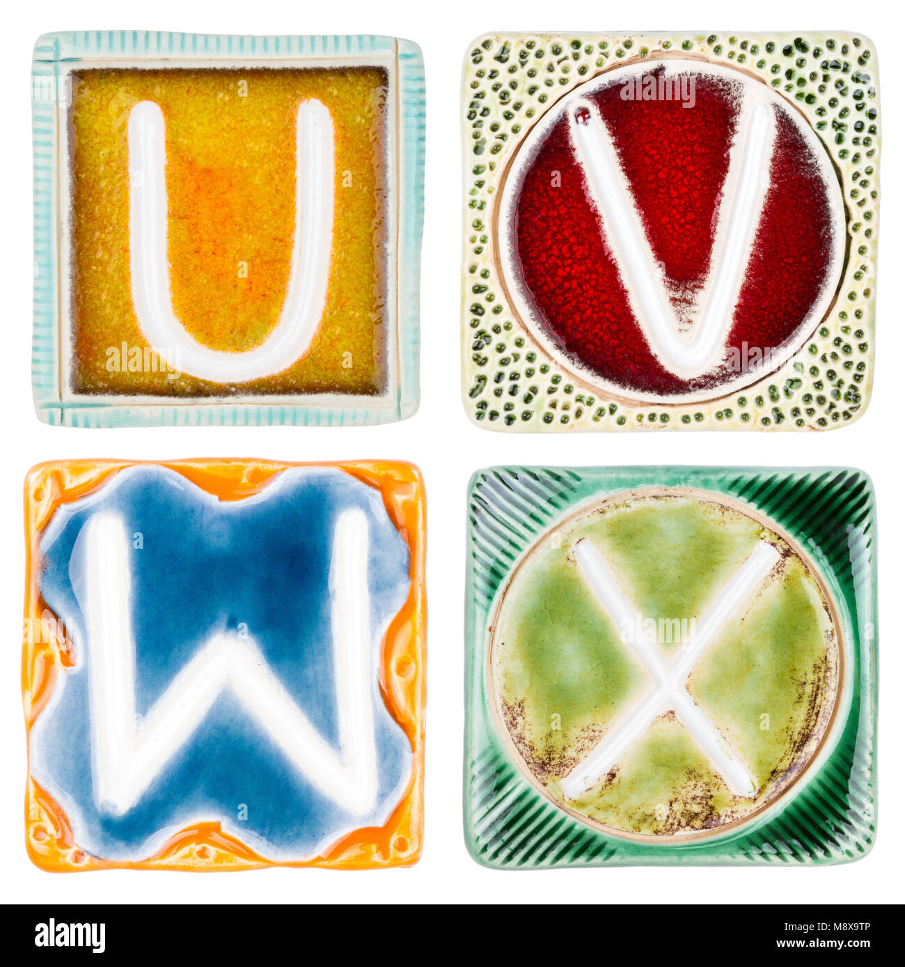 Colorful handmade ceramic letters isolated on white background Stock ...