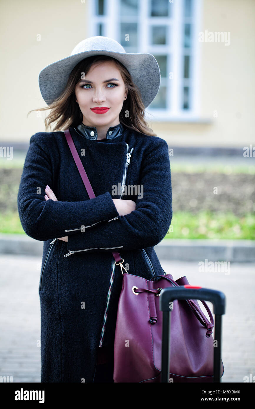 Cute Woman Fashion Model in Hat in City Center Stock Photo - Alamy