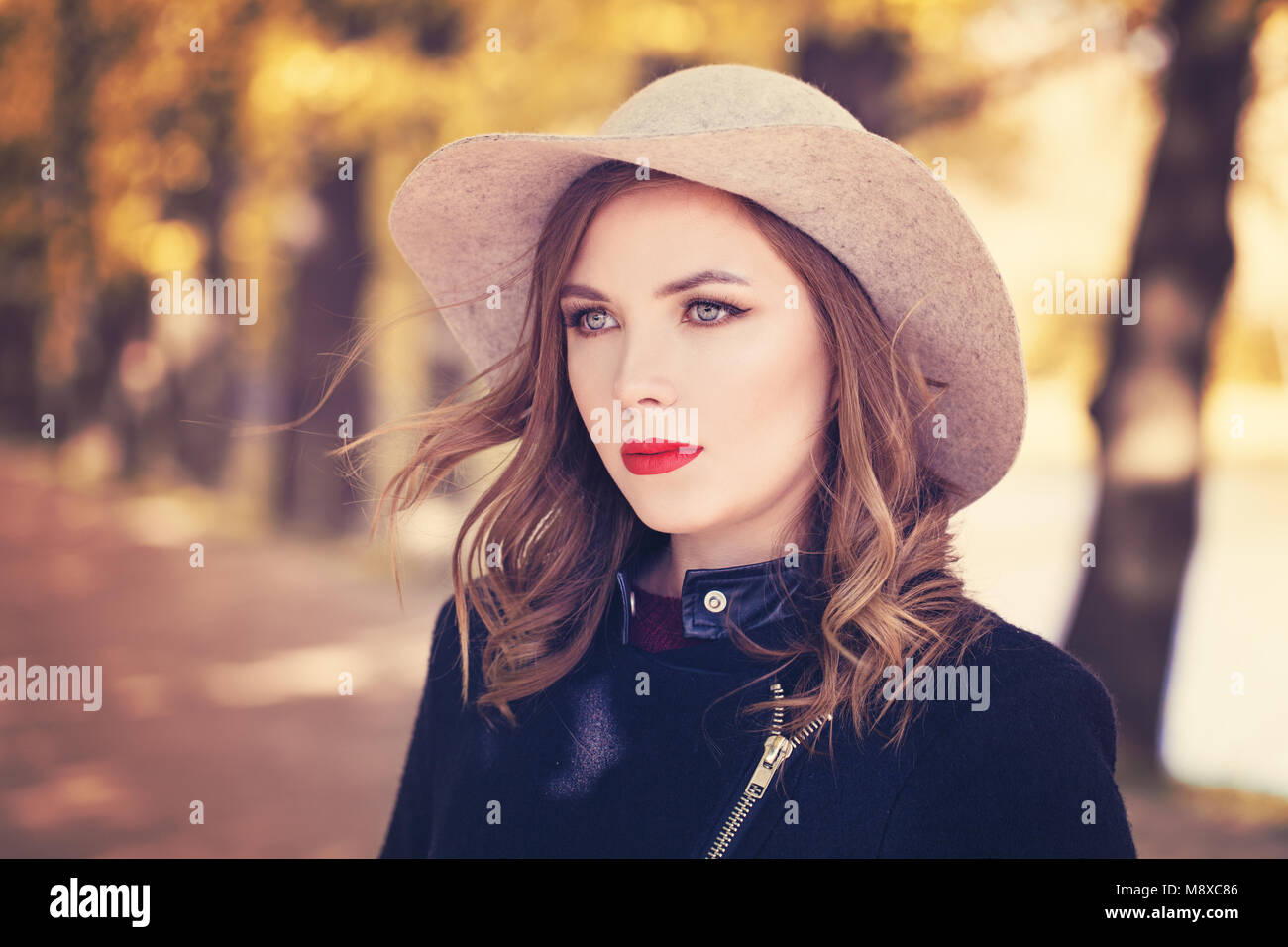 Autumn Model Woman wearing Grey Hat Outdoors Stock Photo - Alamy