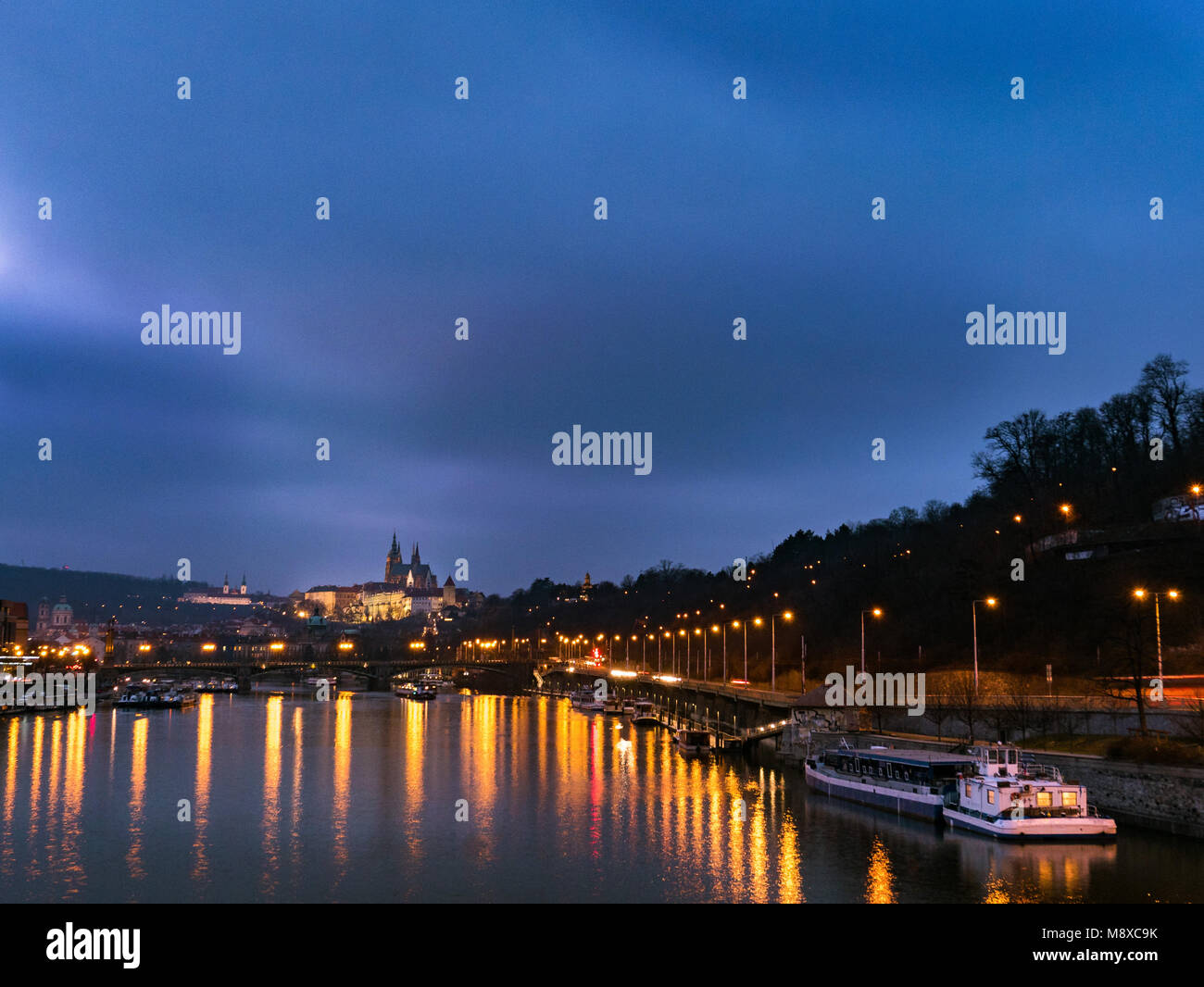 Scenic view of bridges on the Vltava river and historical center of ...