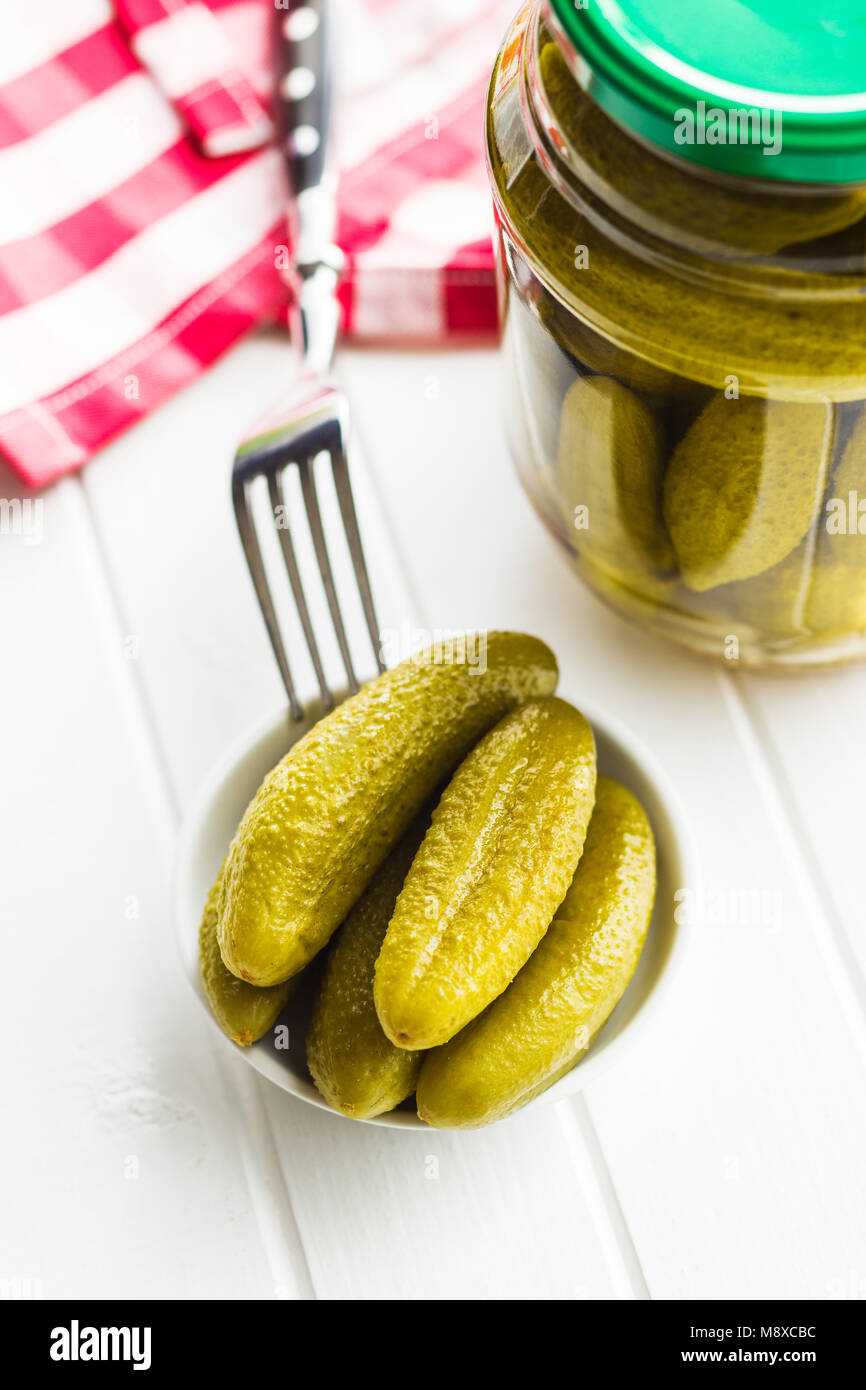 Pickles in bowl. Tasty preserved cucumbers in bowl Stock Photo - Alamy