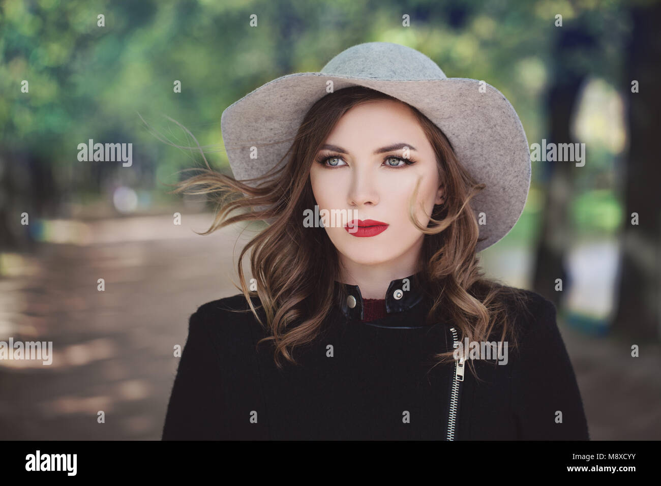 Beautiful Model Woman on Greenery Background Outdoors. Makeup ...