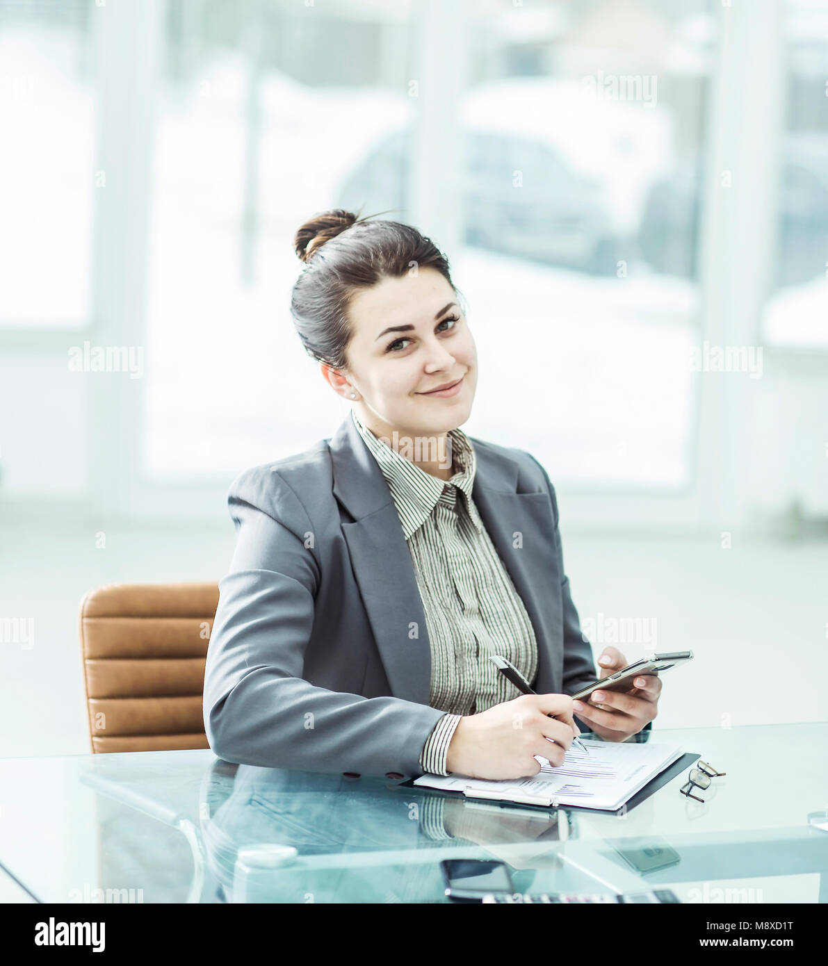 Manager Finance at his Desk in a bright office Stock Photo - Alamy