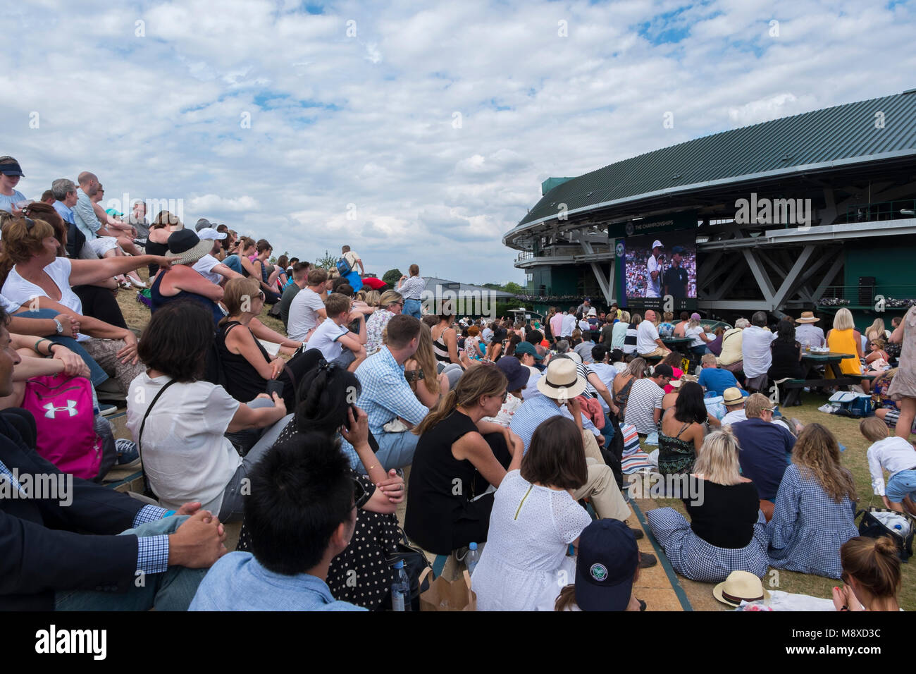 Crowds of spectators on Henman Hill watching Andy Murray on the big ...