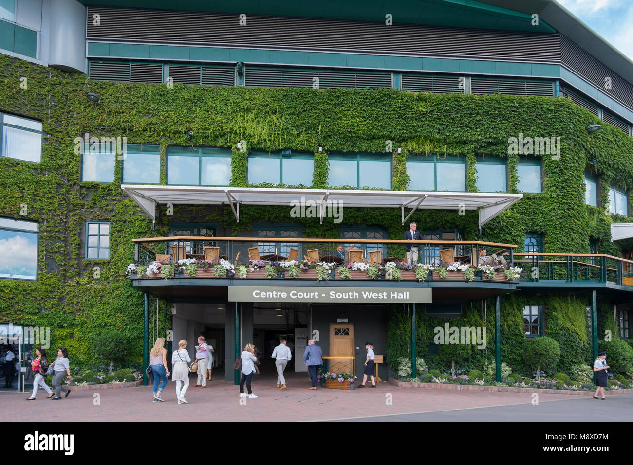 People walking around the grounds outside Centre Court at the Wimbledon ...