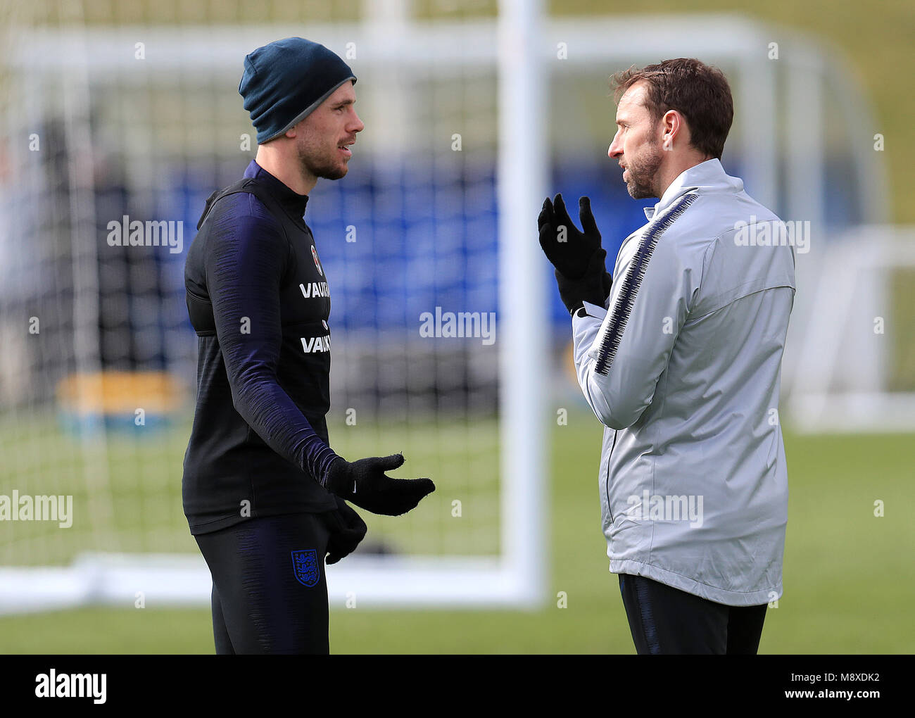 England's Jordan Henderson (left) and manager Gareth Southgate during ...