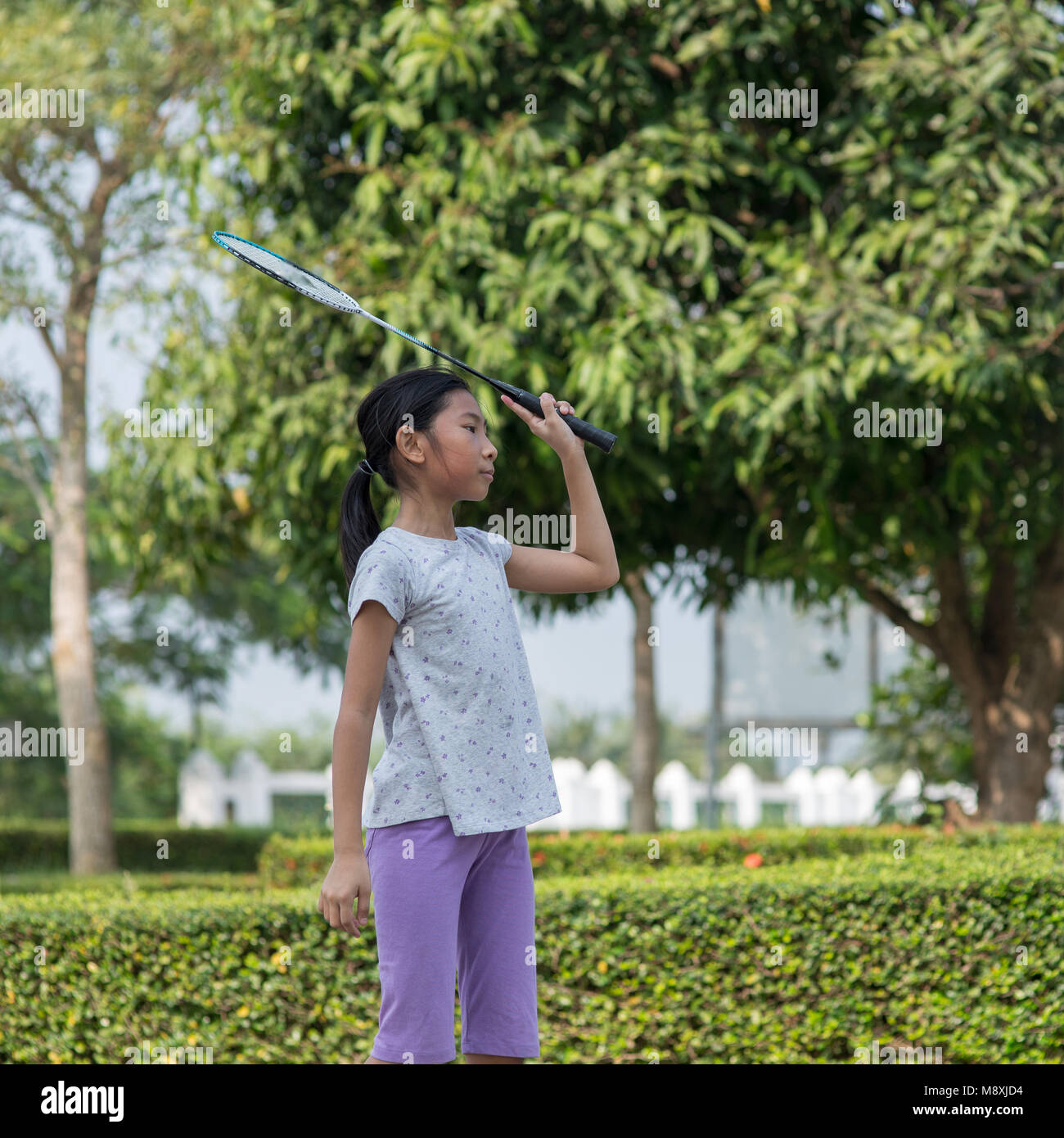 Beautiful girl playing badminton hi-res stock photography and images ...