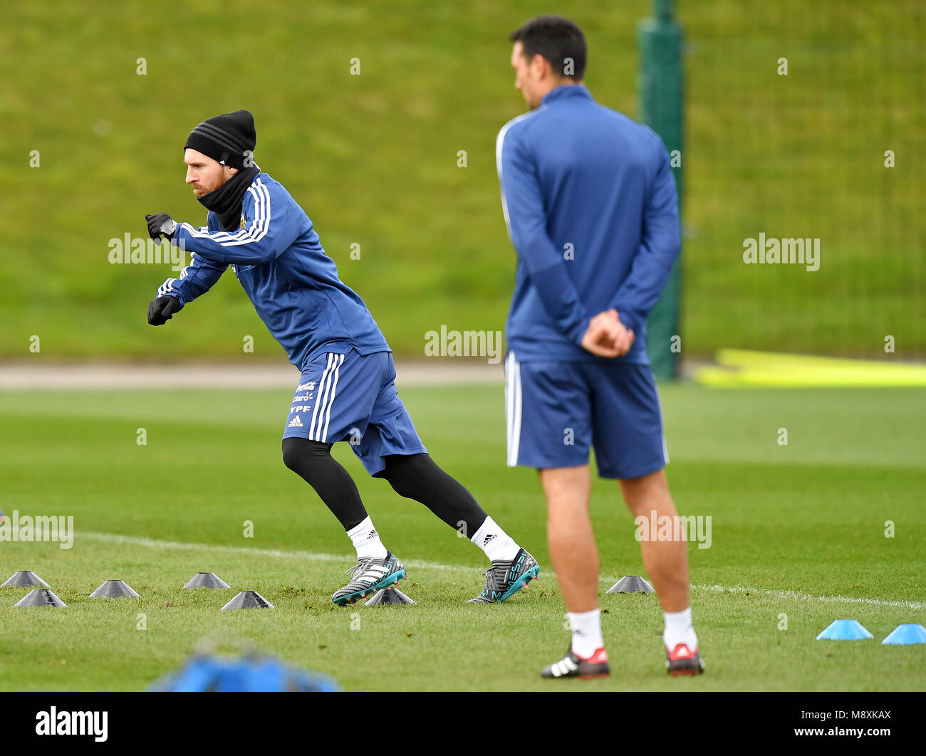 Argentina's Lionel Messi (left) during a training session at the City ...