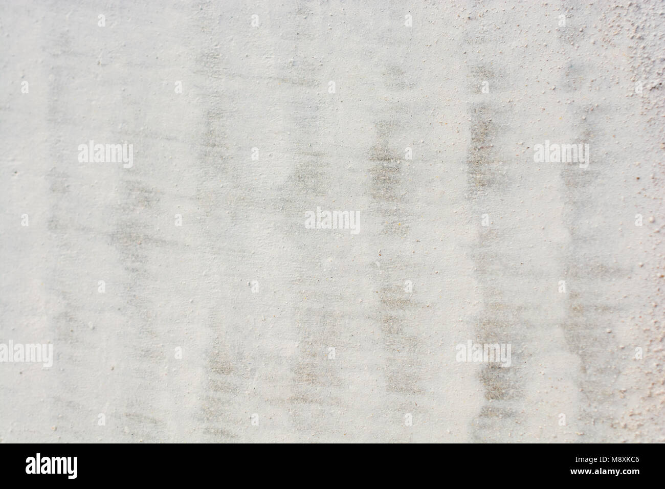 Pattens are formed on a concrete background Stock Photo - Alamy