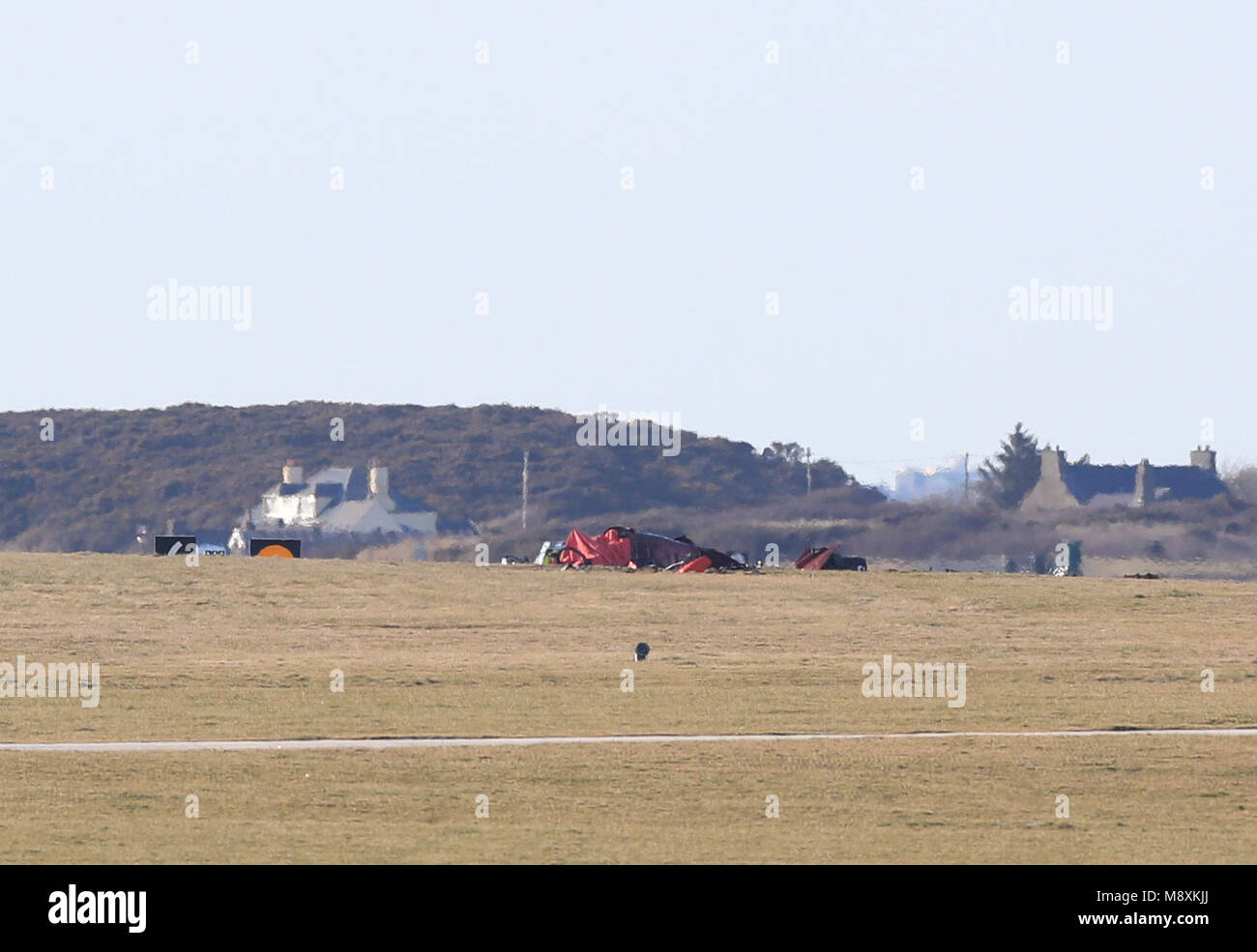 Wreckage after a Red Arrows jet crashed at RAF Valley in north Wales ...