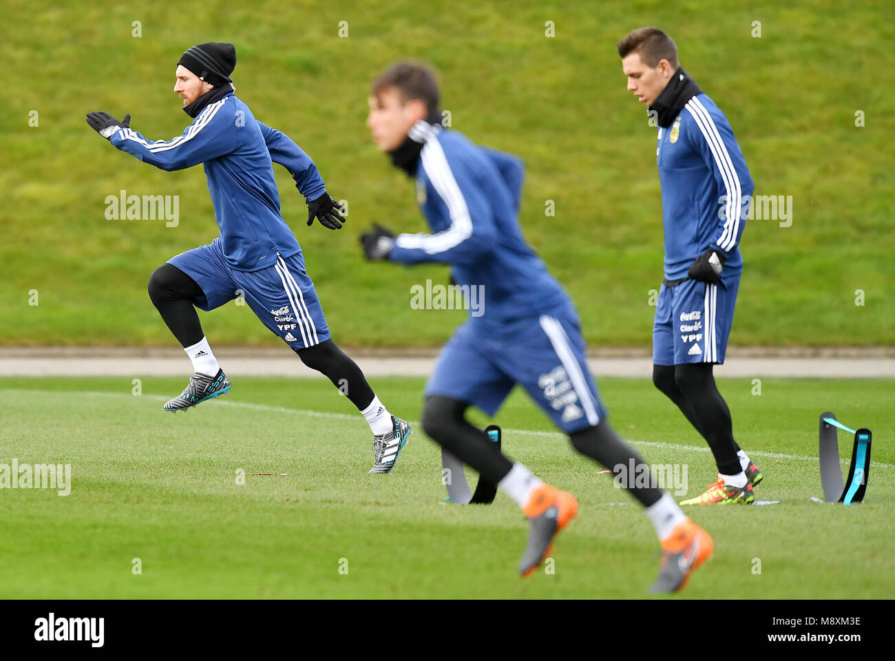 Argentina's Lionel Messi (left) during a training session at the City ...