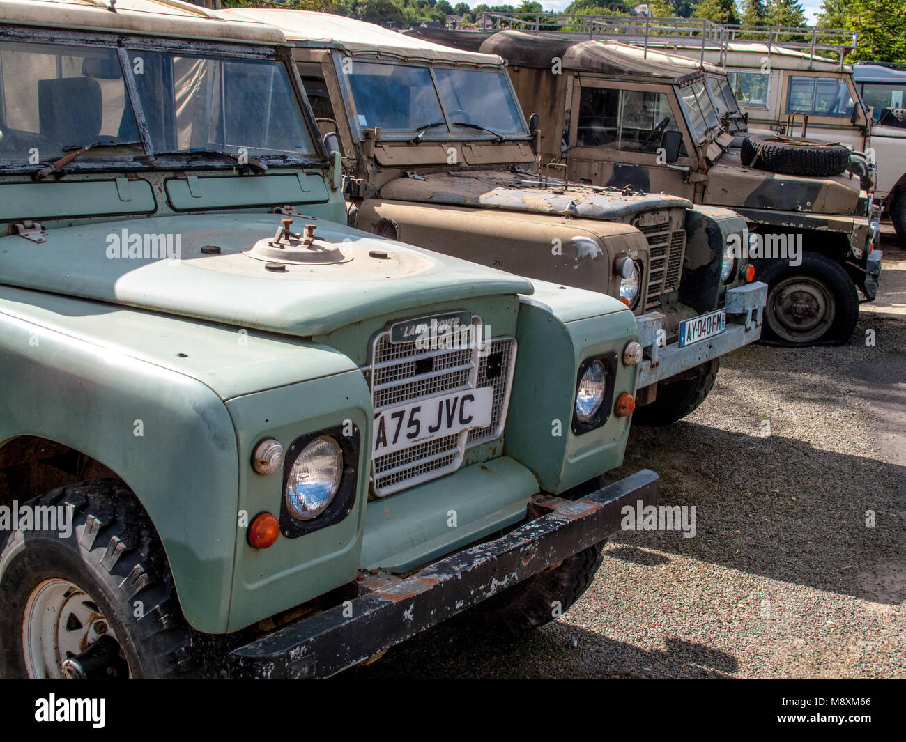 Land Rover’s in garage Stock Photo - Alamy