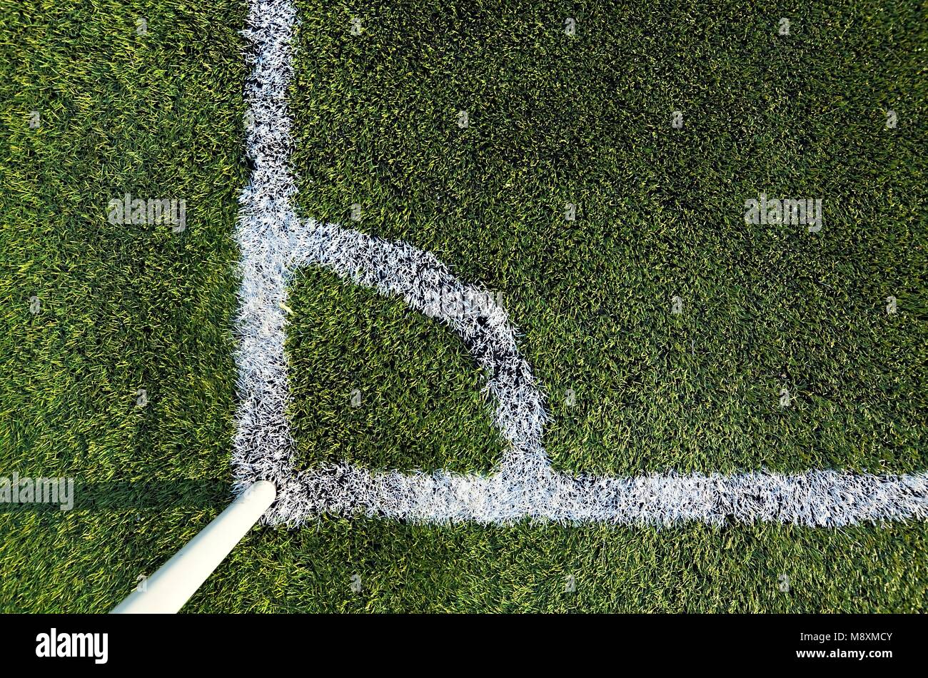 Corner of a football (soccer) field is made from synthetic lawn Stock ...