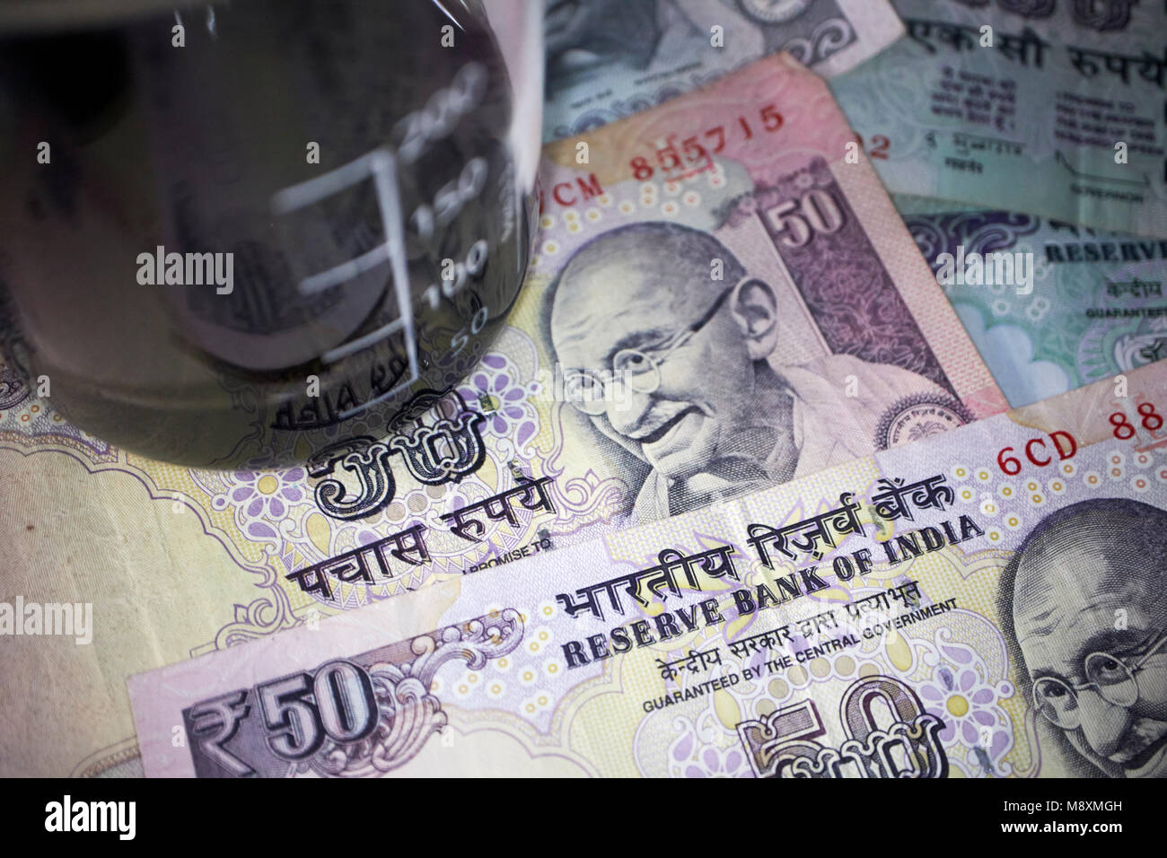 jar of crude oil with indian rupees currency trading concept Stock ...