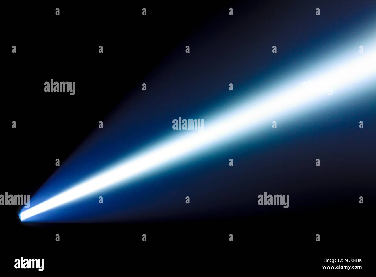 Bright beam from the power flashlight in the dark Stock Photo - Alamy