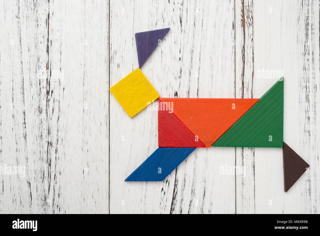 wooden tangram in a rabbit shape with copy space Stock Photo - Alamy