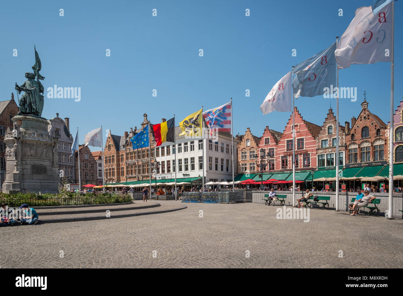 A scene from famous Market Square in Bruges, Belgium, on a sunny summer ...