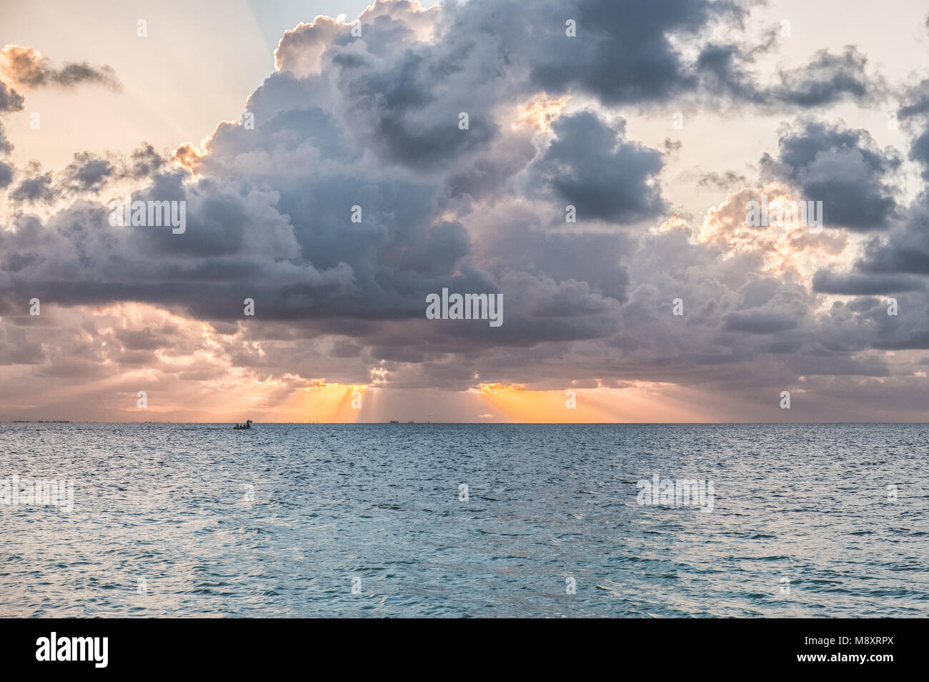 dramatic sky during sunset over water - scenic sunset above ocean Stock ...