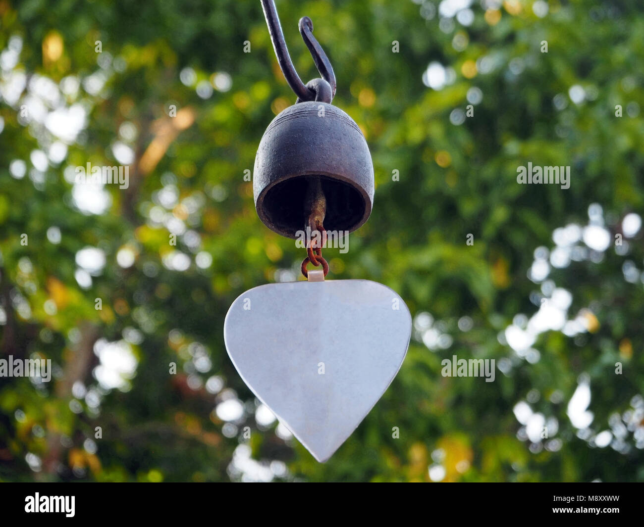 Antique Bell Hanging Over the Door Stock Photo - Alamy