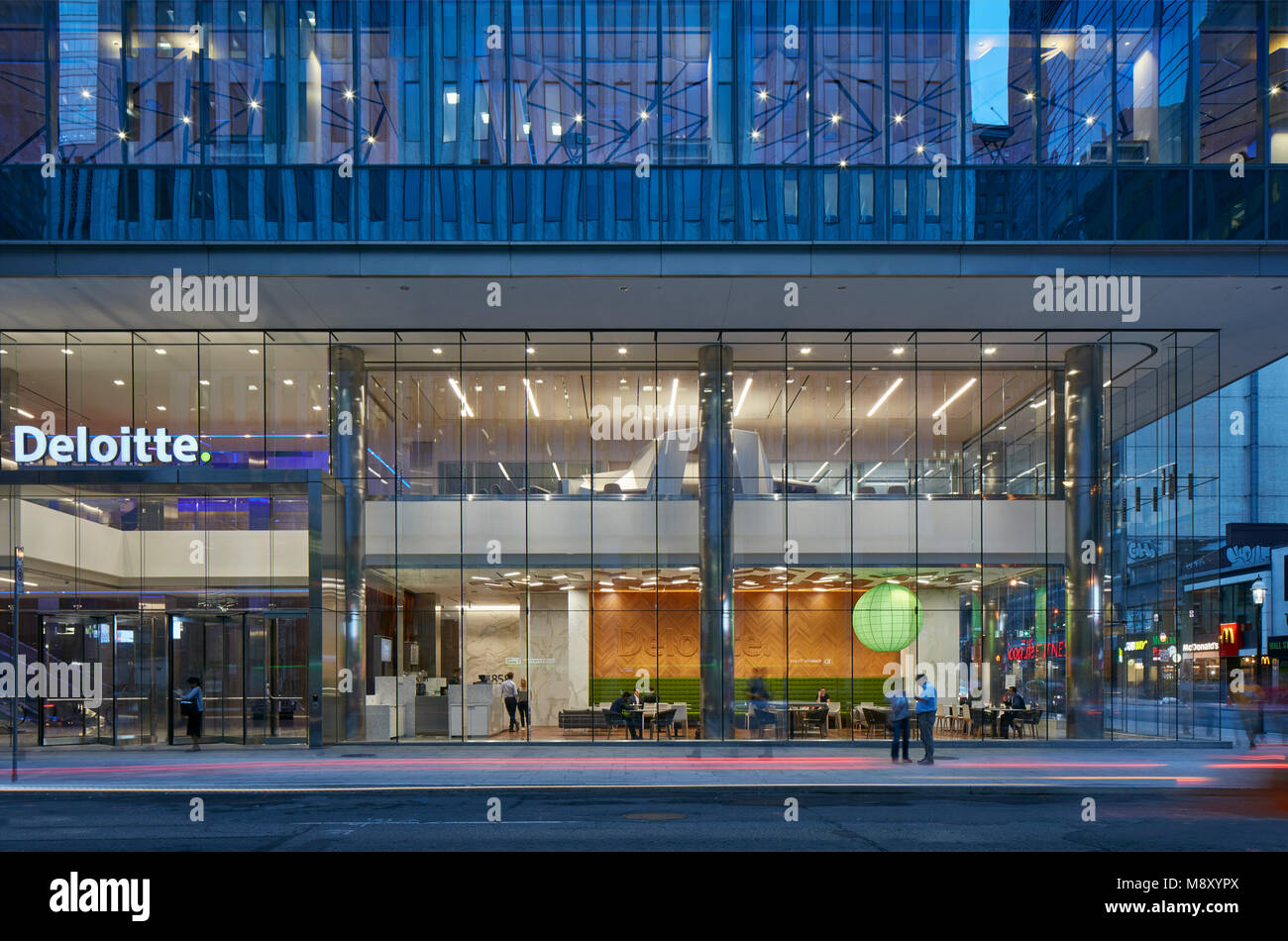View acrossstreet toward transparent glass facade. Deloitte Toronto ...