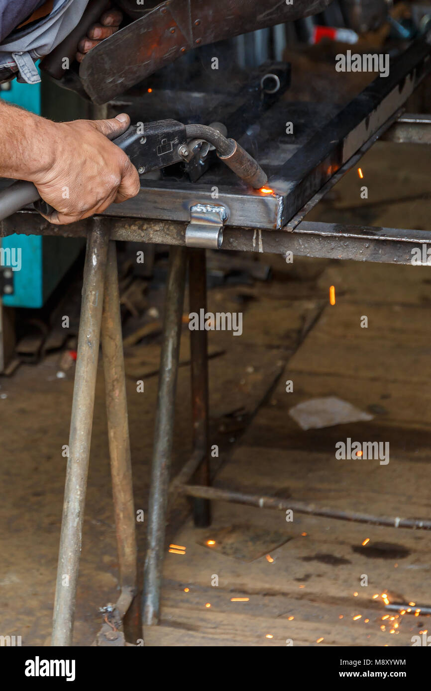 Welding work in a workshop Stock Photo - Alamy