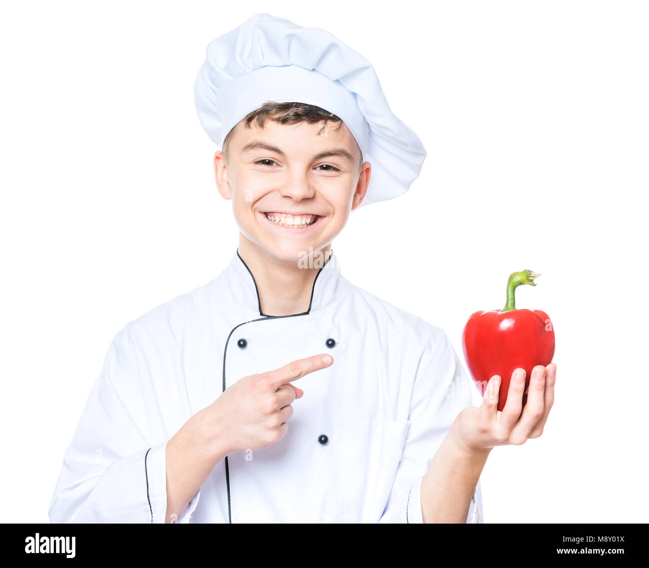 Teen boy wearing chef uniform Stock Photo - Alamy
