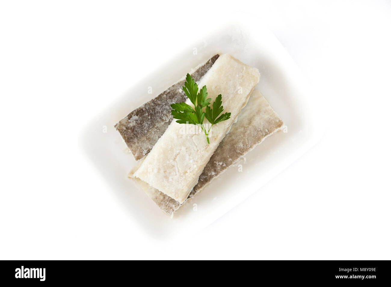 Salted dried cod isolated on white background. Typical Easter food ...