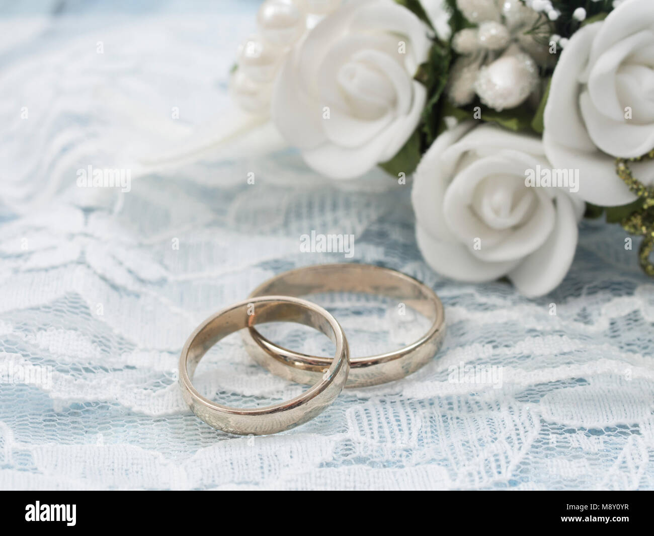 wedding rings in the decorative arrangement Stock Photo - Alamy