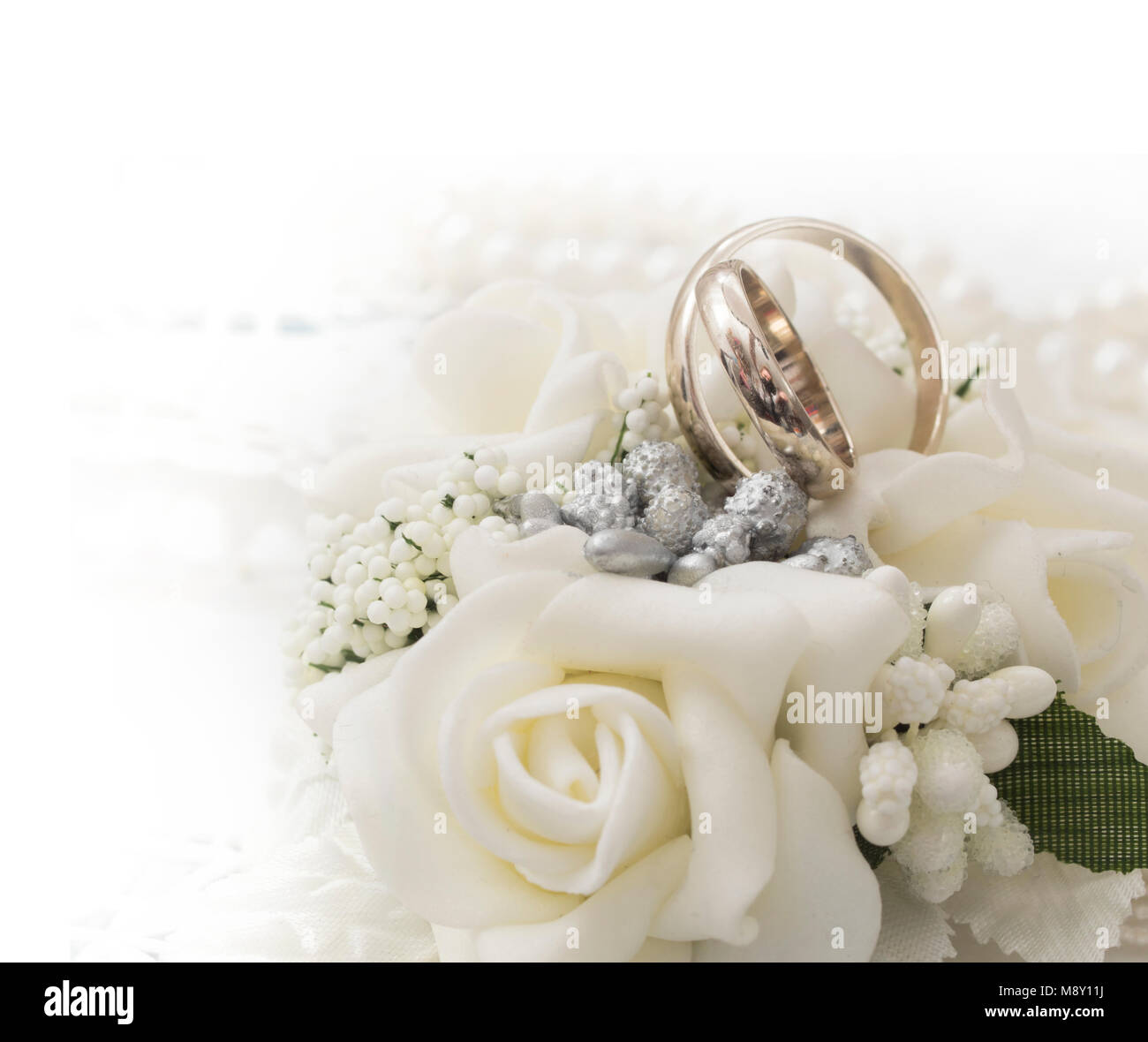 wedding rings in the decorative arrangement Stock Photo - Alamy