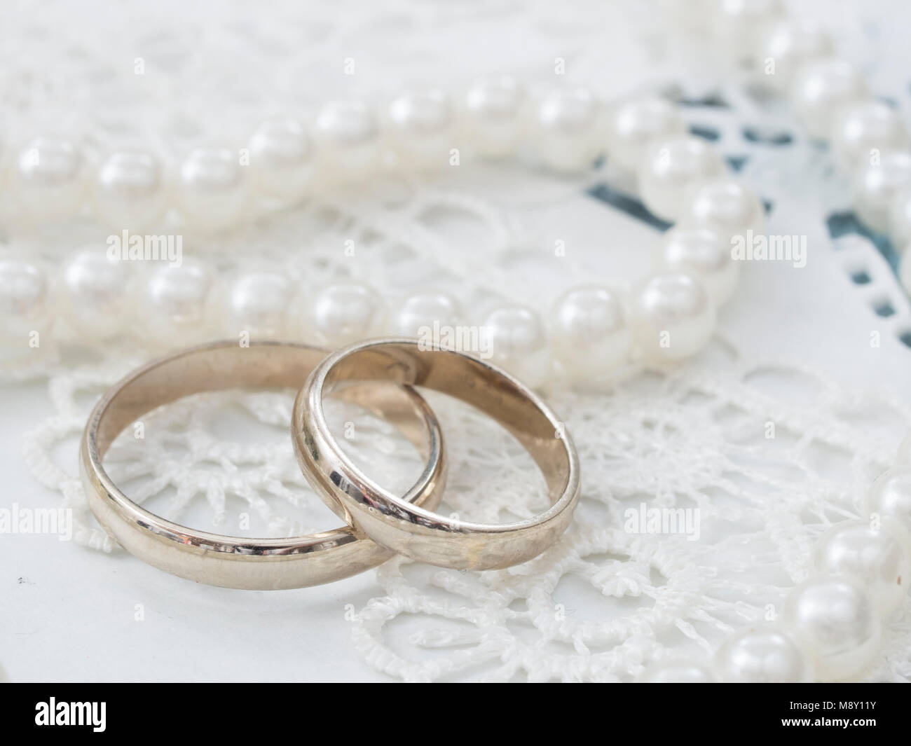 wedding rings in the decorative arrangement Stock Photo - Alamy