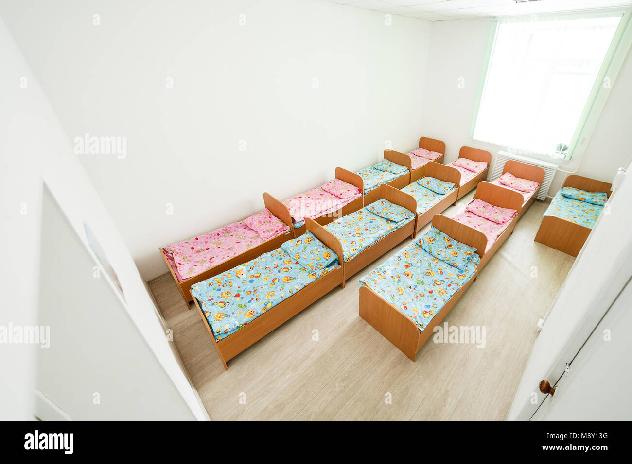 Private kindergarten or nursery bedroom. Top view Stock Photo - Alamy