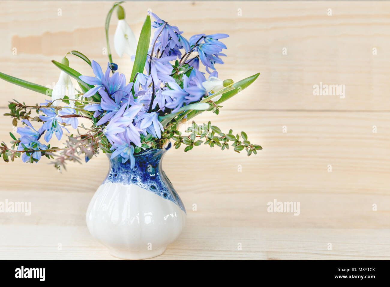 Bunch of spring flowers, small bouquet of tender spring flowers in vase ...
