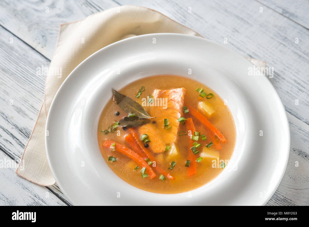 Portion of salmon soup Stock Photo - Alamy