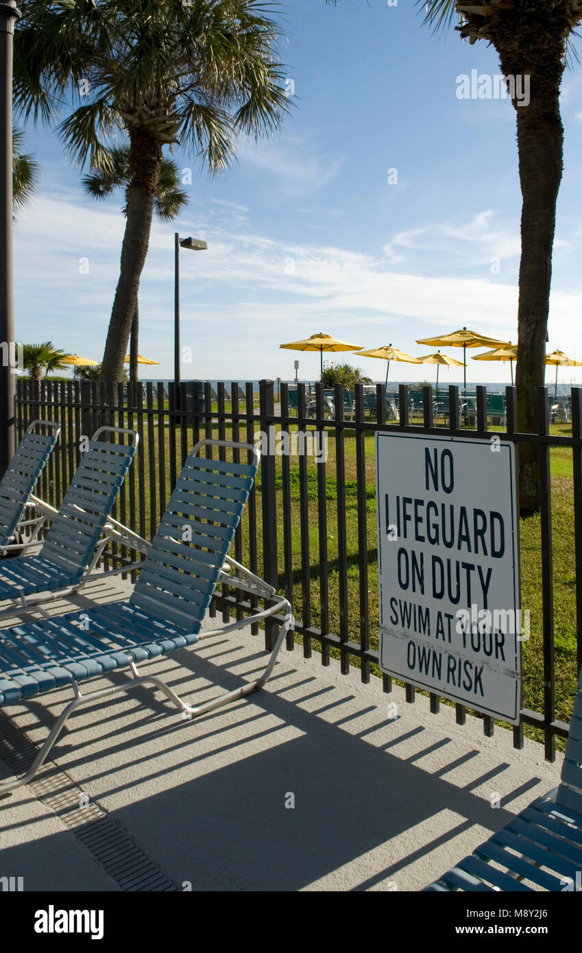 No lifeguard swimming pool sign Stock Photo - Alamy