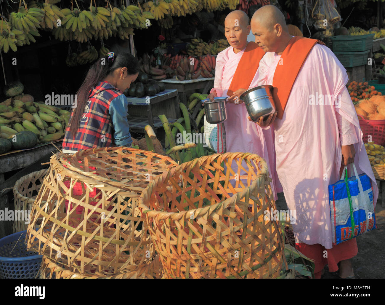 Myanmar, Mon State, Mawlamyine, buddhist nuns, gathering alms Stock ...