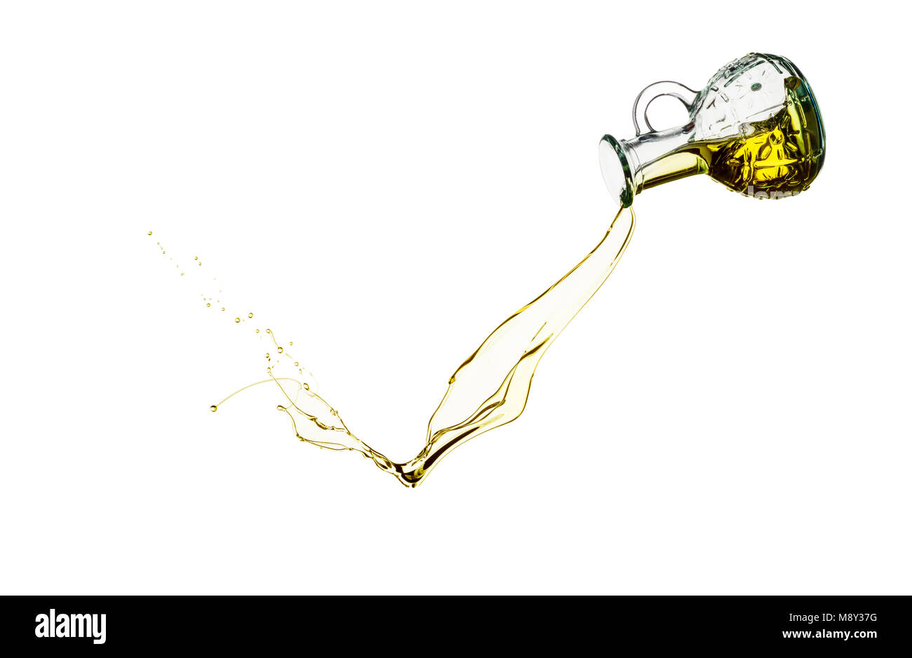 Olive oil splashinf from bottle isolated on white background Stock ...