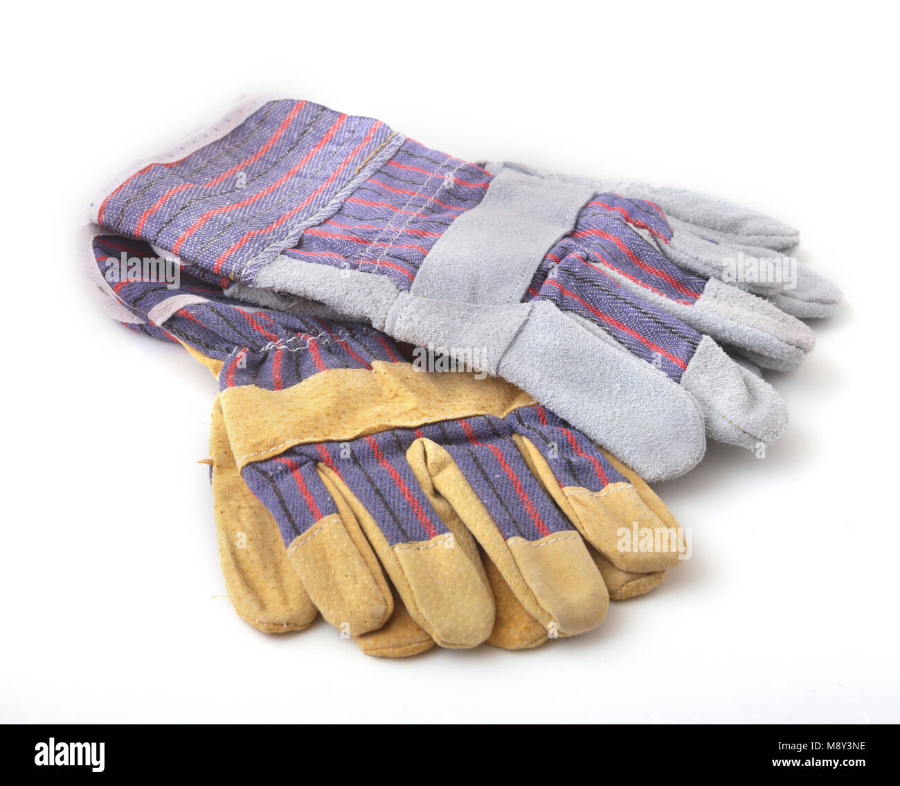 safety gloves on white background. Protective worker gloves Stock Photo ...