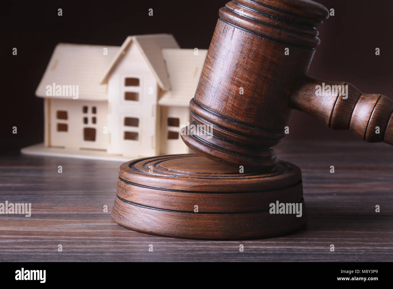 House Auction, auction hammer , symbol of authority and Miniature house ...