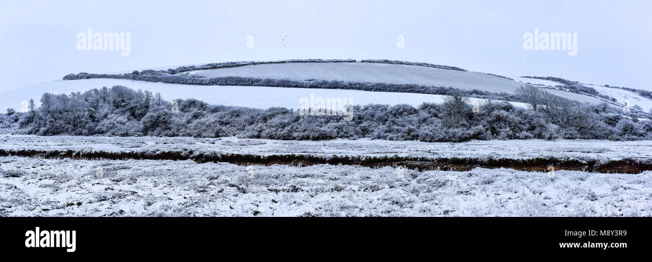 A panoramic view of snow covered hill overlooking the Gannel River in ...