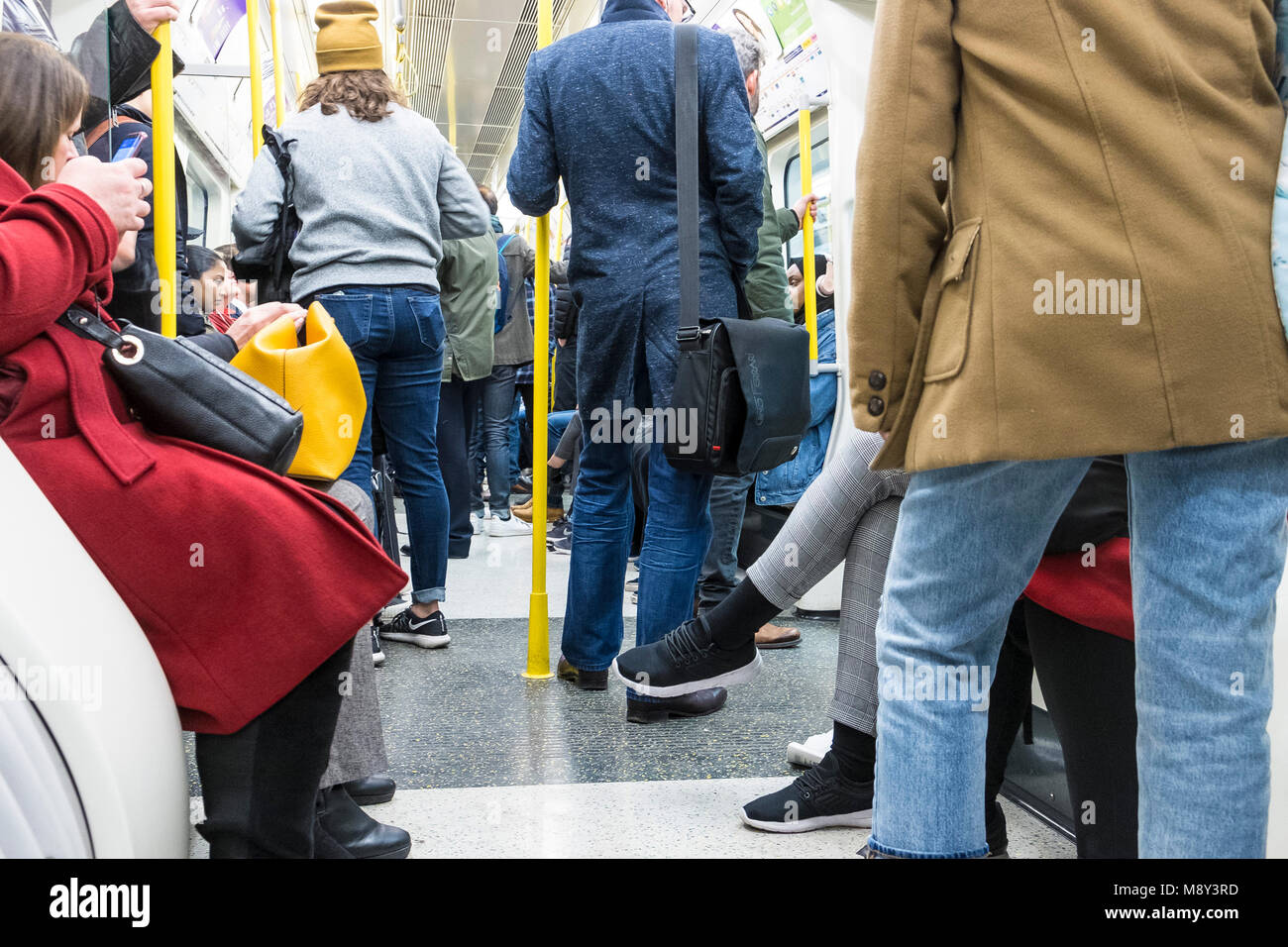 A busy London Underground tube train Stock Photo - Alamy